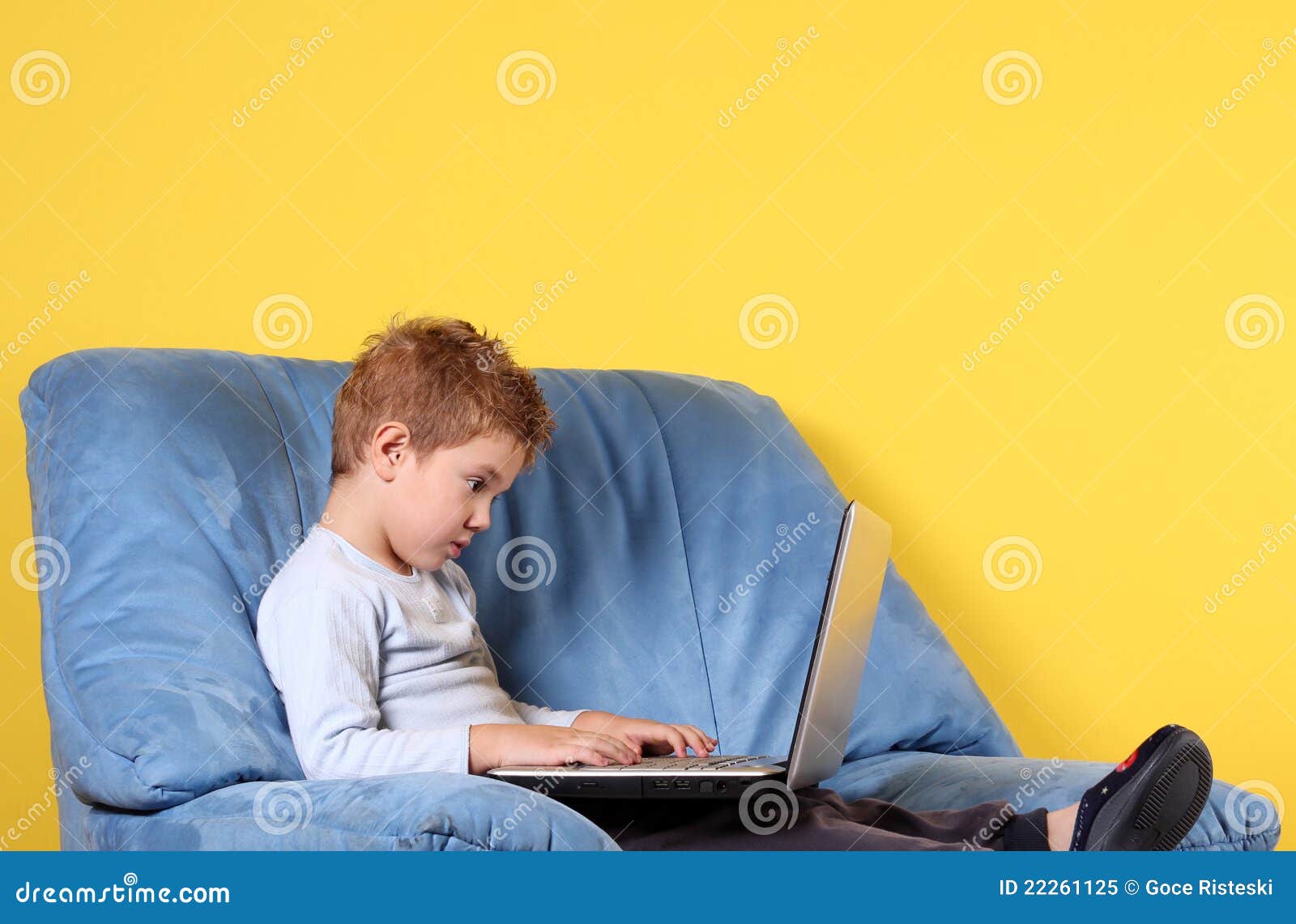 Boy typing on laptop stock image. Image of young, sweet - 22261125