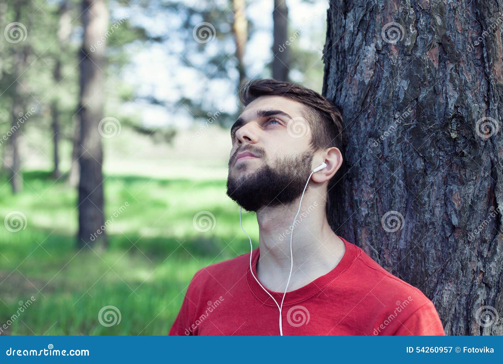 Boy under a tree stock image. Image of listens, pleasure - 54260957