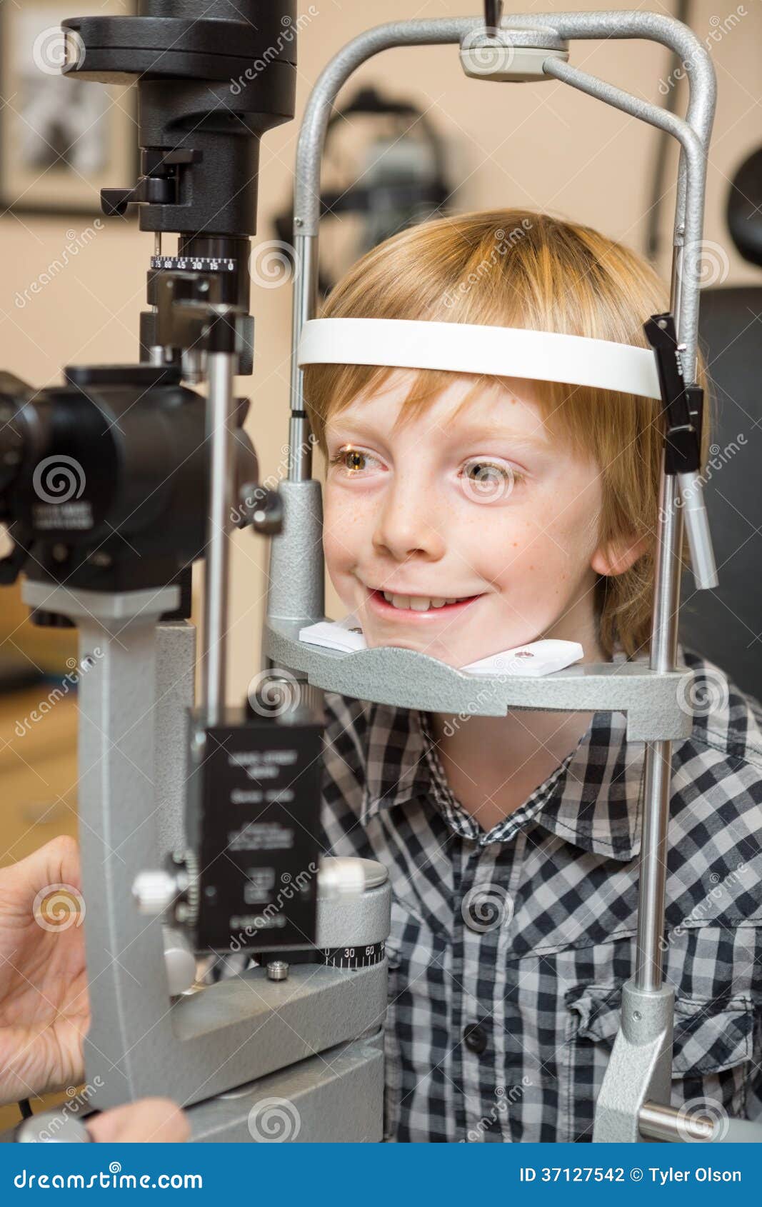Boy Undergoing Eye Examination Test with Slit Lamp Stock Photo - Image ...