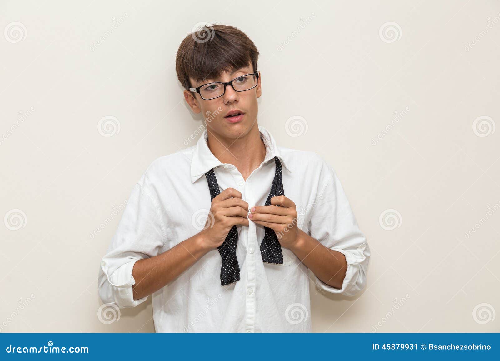 Boy with undone bow tie stock image. Image of unkempt - 45879931