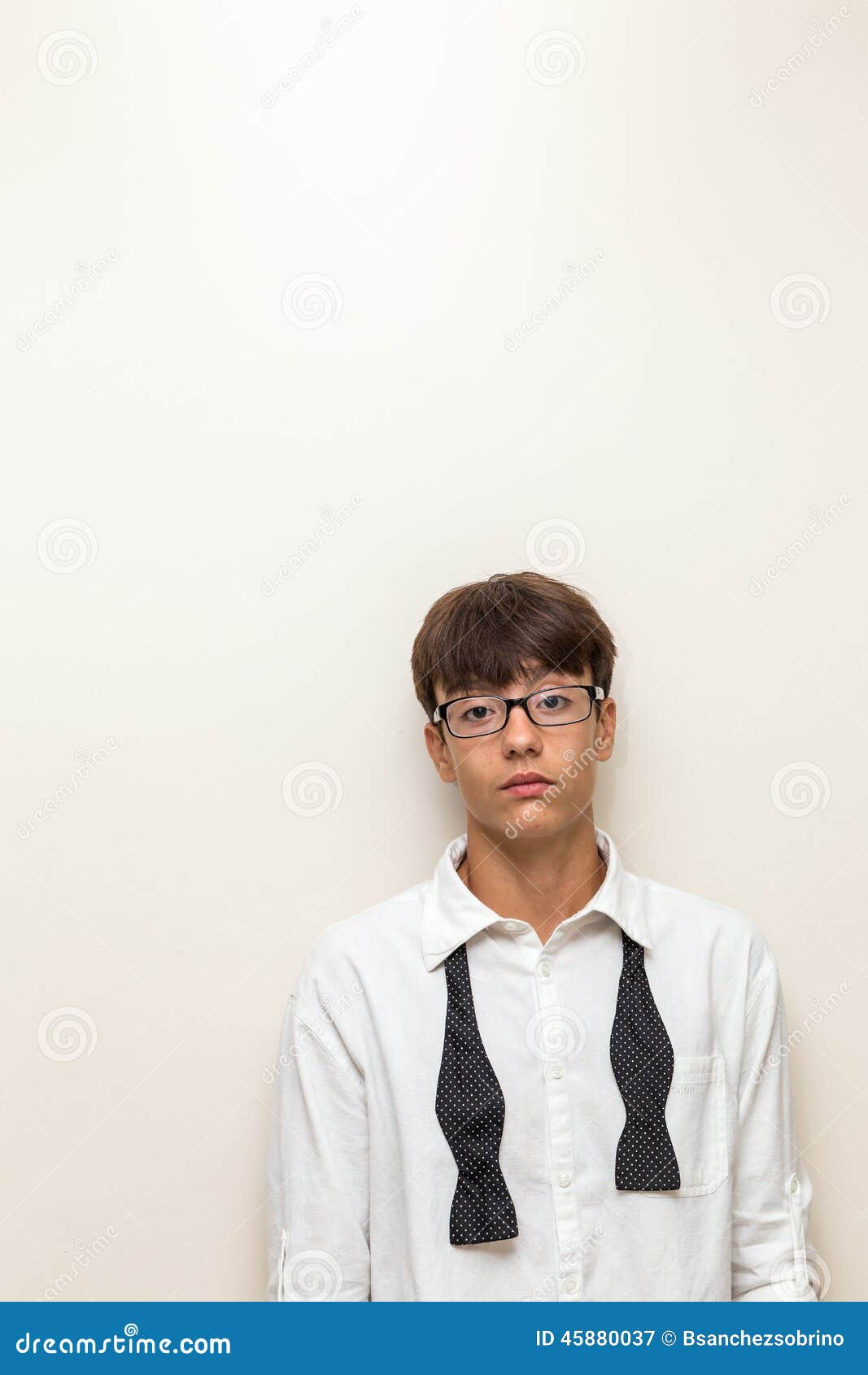 Boy with undone bow tie stock image. Image of vertical - 45880037