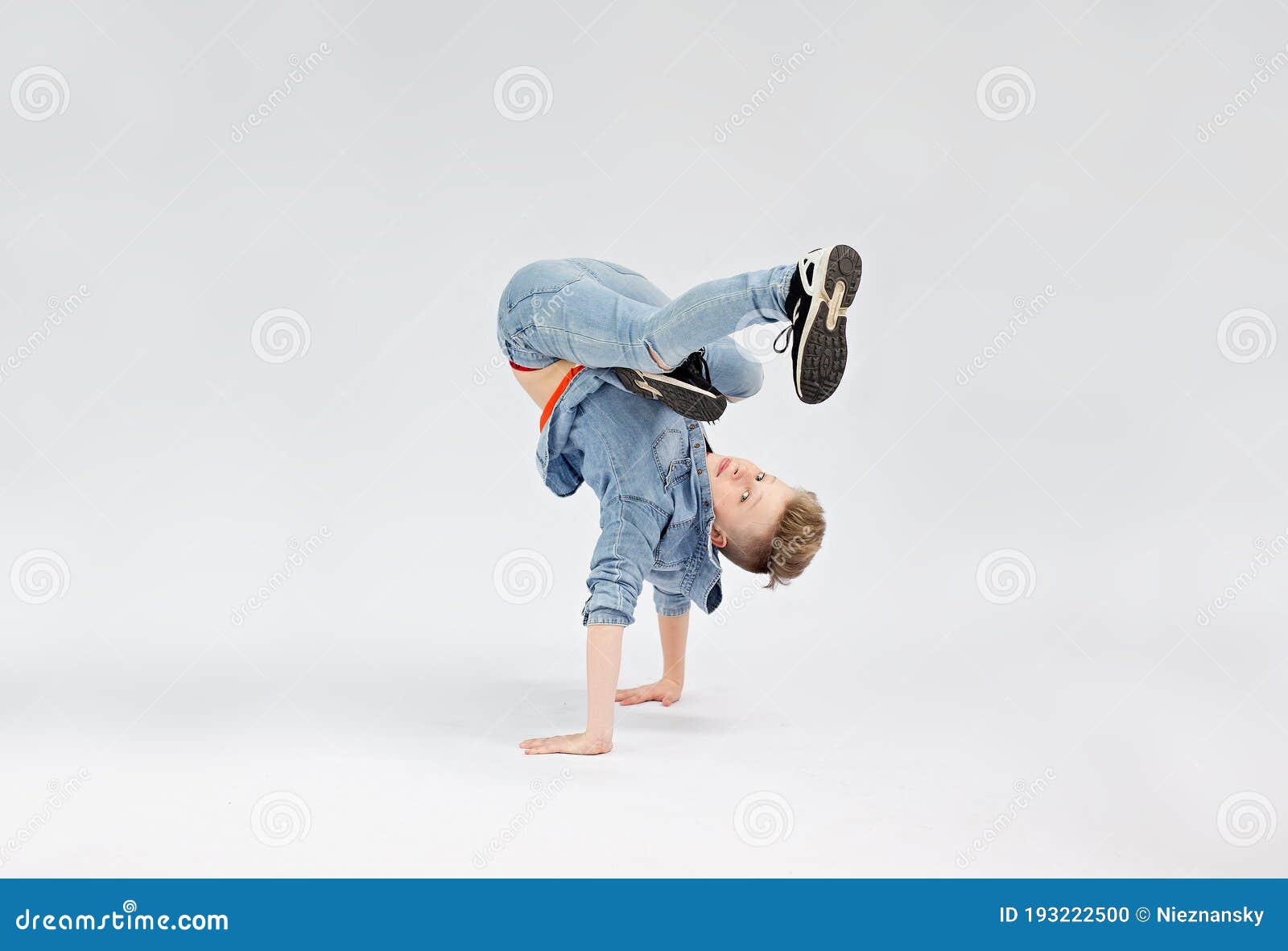 A Boy in an Unusual Breakdance Pose, Dance and Gymnastic Position Stock ...