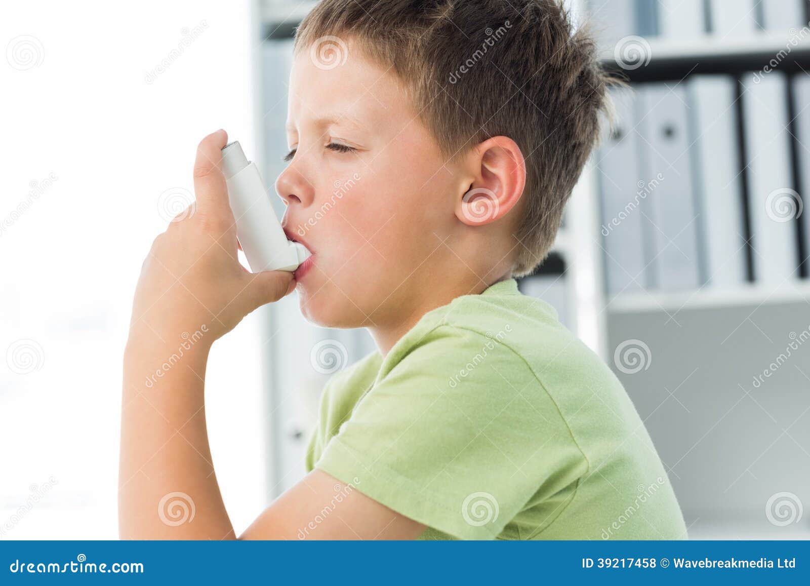 Boy Using an Asthma Inhaler in Clinic Stock Photo - Image of recovery ...
