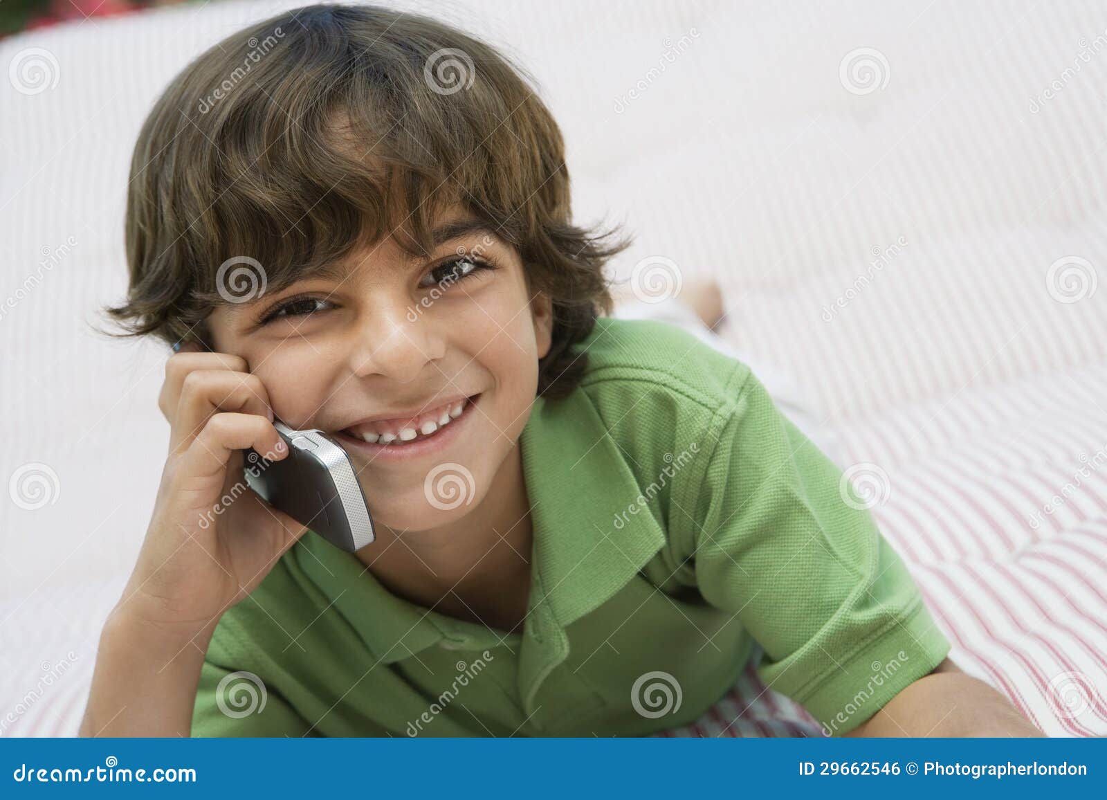 Boy Using Cell Phone stock photo. Image of multiethnic - 29662546