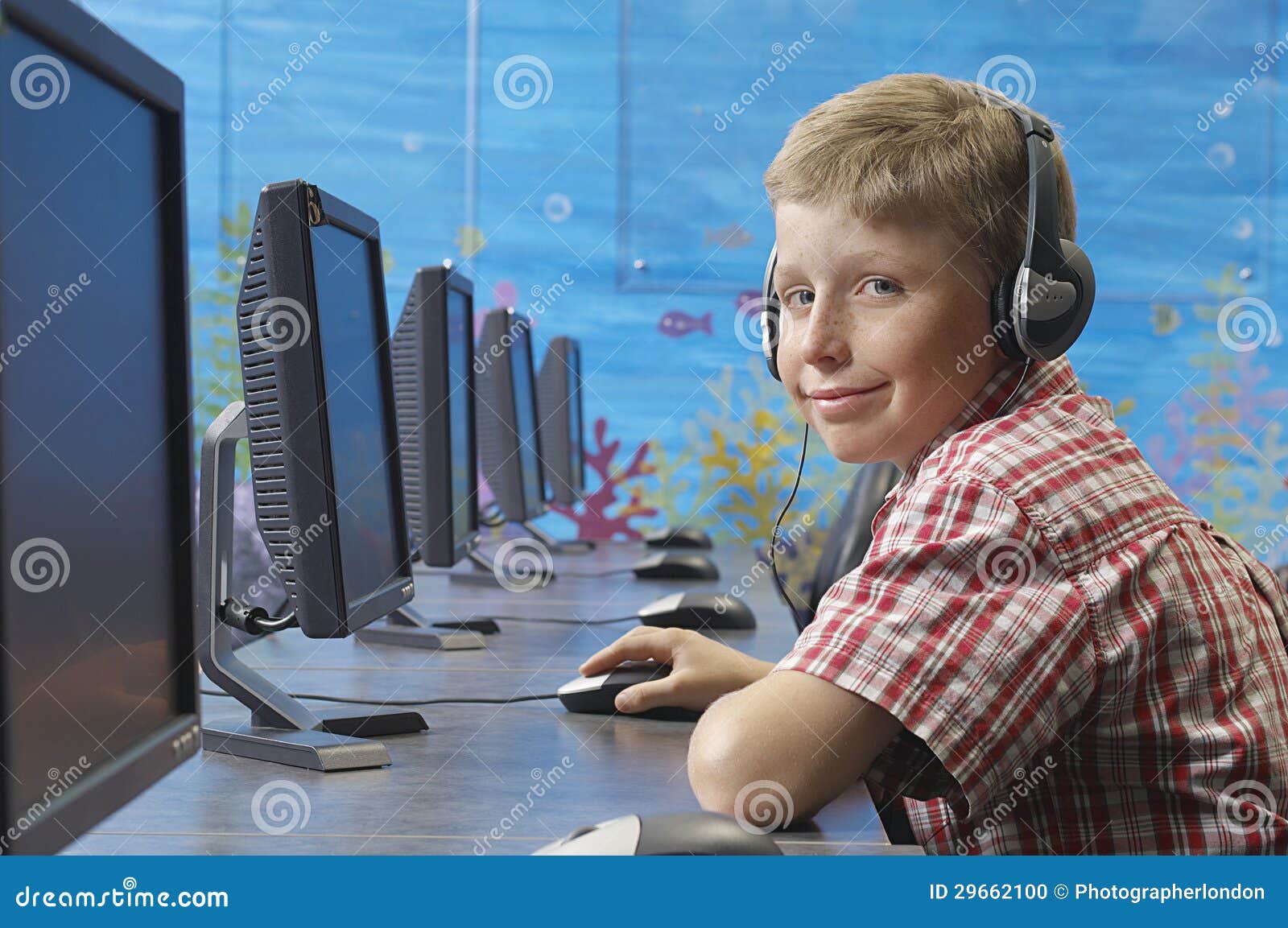 Boy Using Computer in Lab stock photo. Image of portrait - 29662100