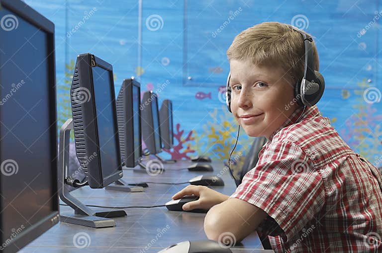 Boy Using Computer in Lab stock photo. Image of portrait - 29662100