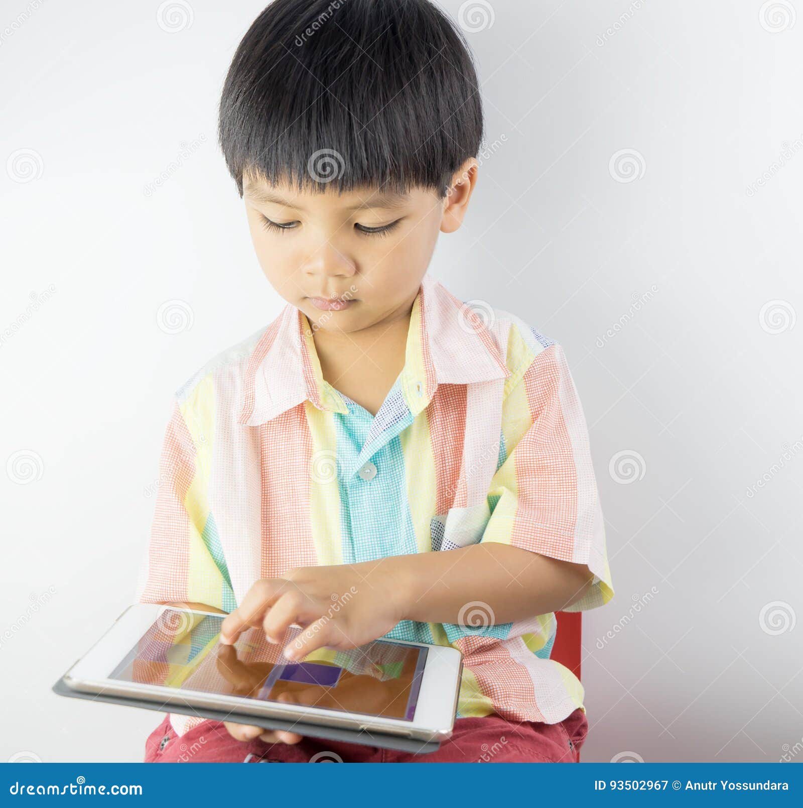 Boy is Using Finger To Touch Tablet Screen. Stock Image - Image of baby ...