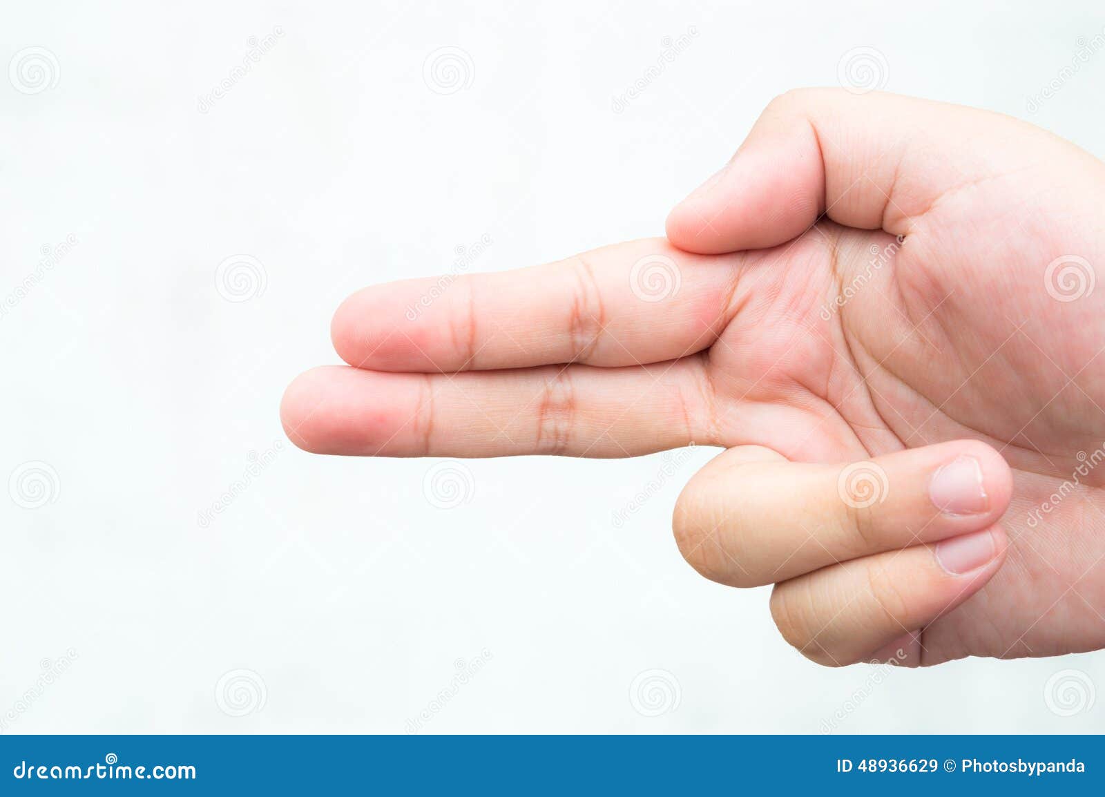 A Boy Using His Hand As a Gun, Shooting or Pointing To the Left Stock ...