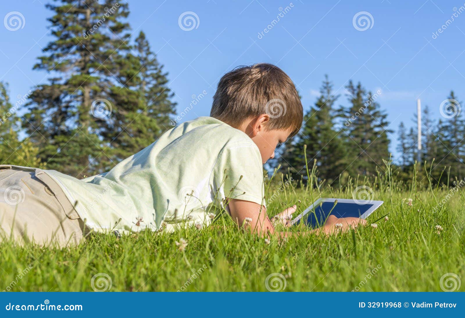 Boy Using iPad stock photo. Image of outdoor, communication - 32919968