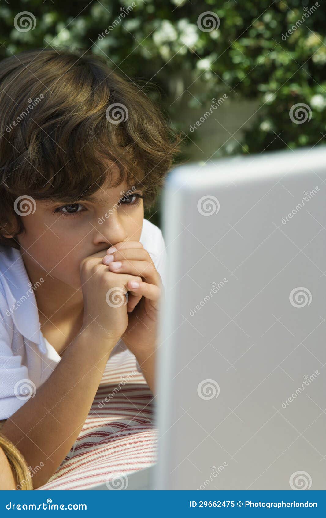 Boy Using Laptop stock image. Image of relaxation, concentrating - 29662475