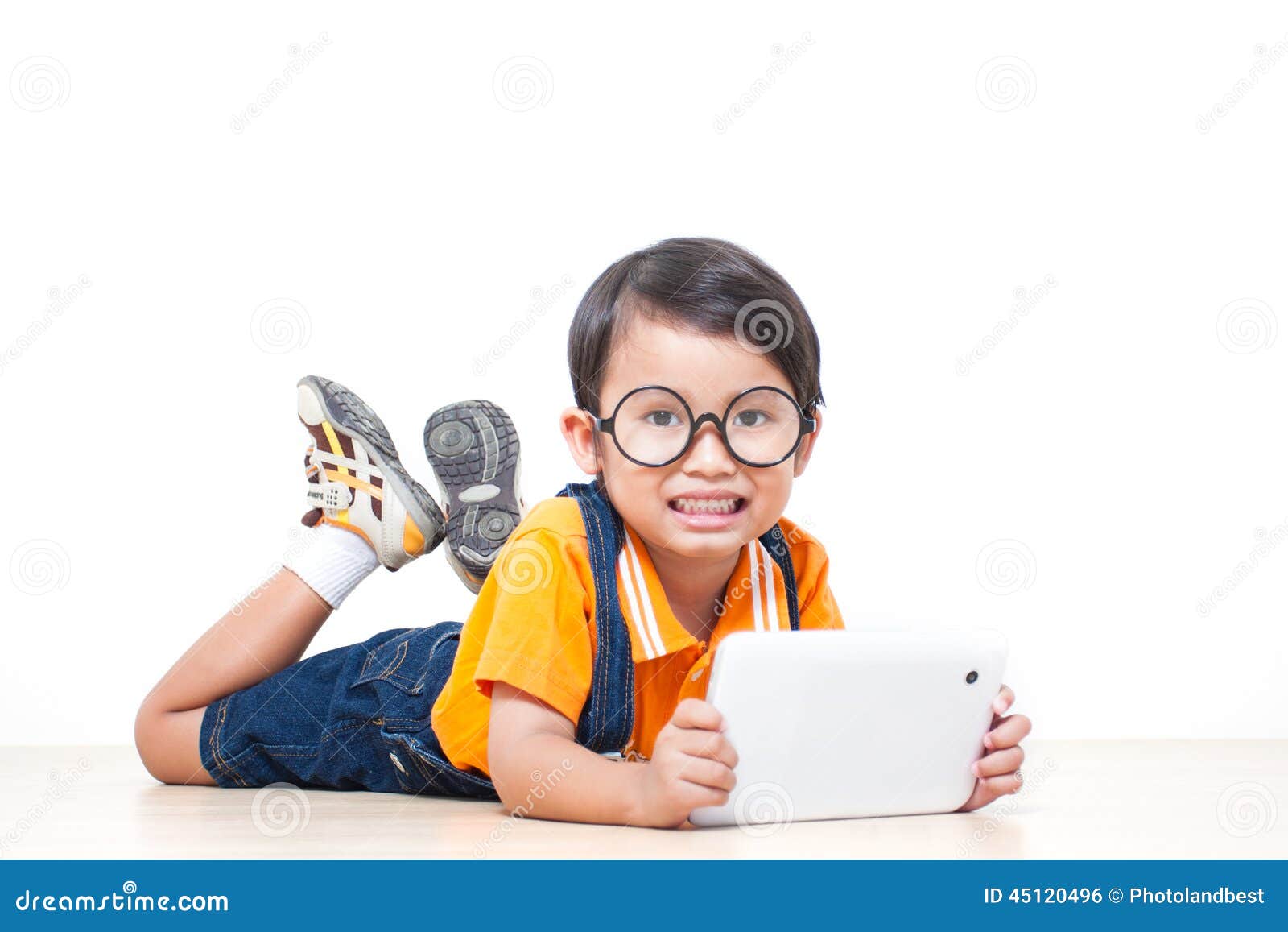 Boy using laptop computer stock photo. Image of cheerful - 45120496