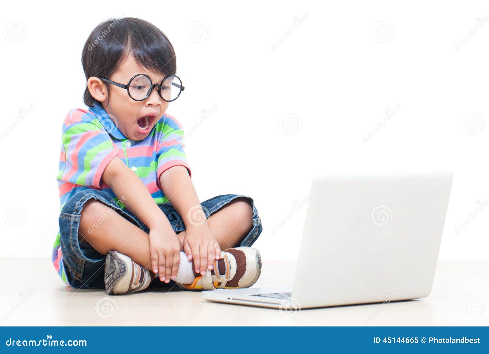 Boy using laptop computer stock image. Image of communication - 45144665