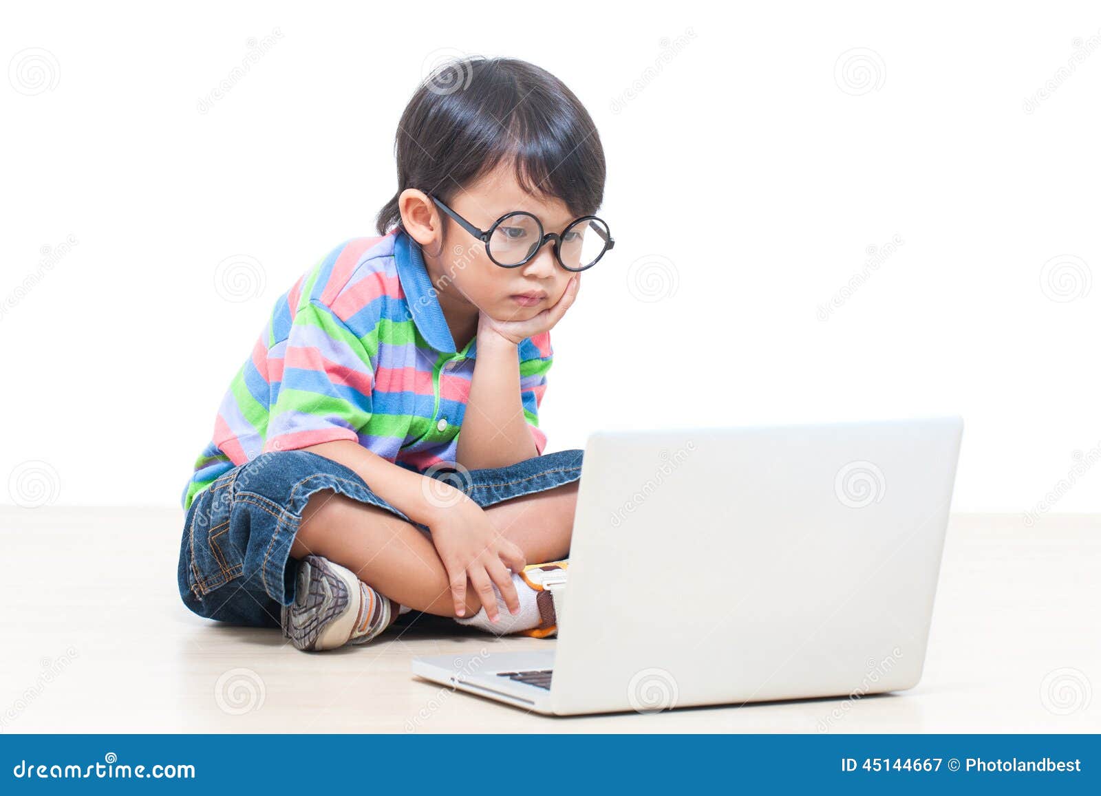 Boy using laptop computer stock image. Image of laptop - 45144667