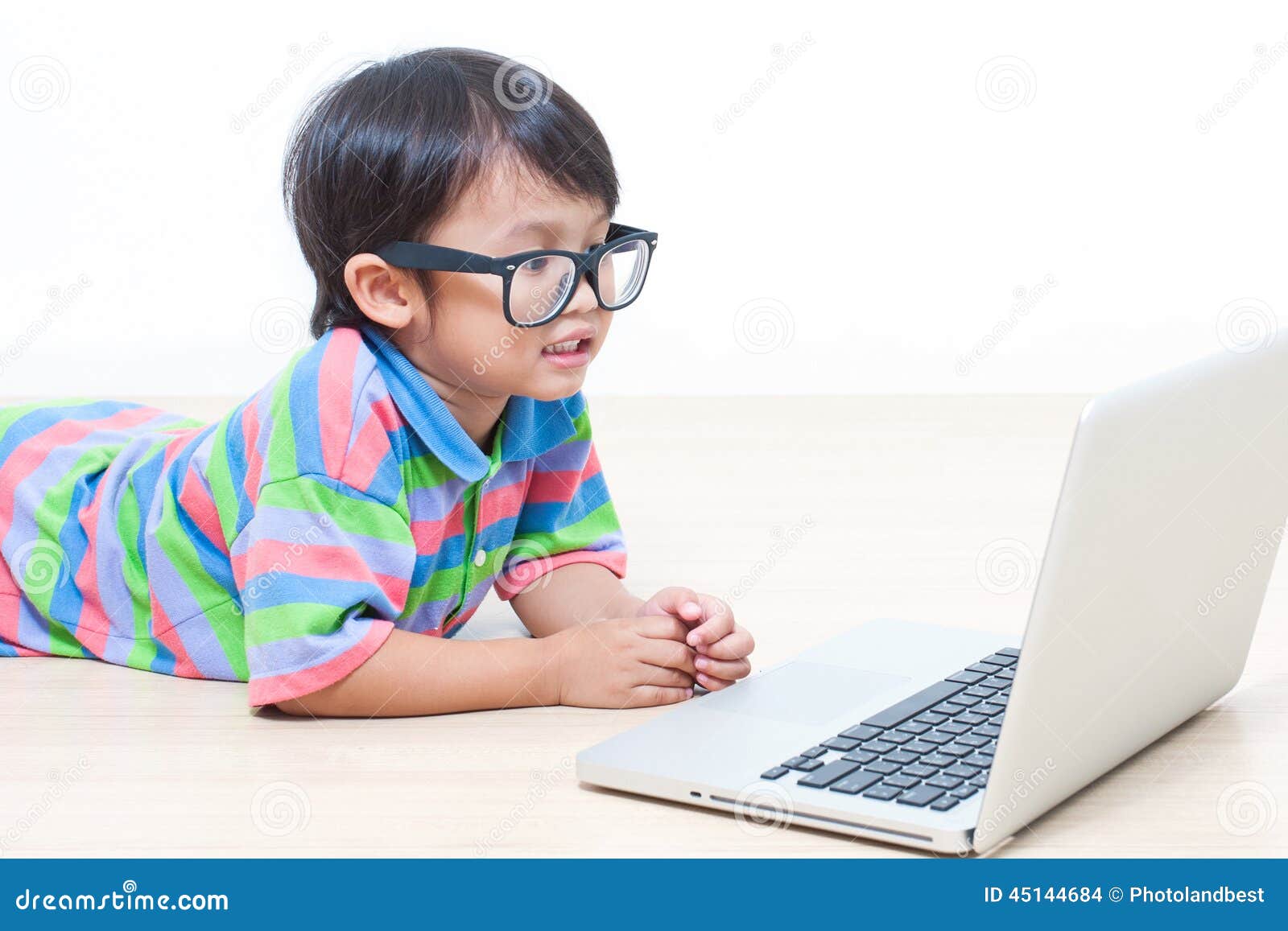 Boy using laptop computer stock photo. Image of cute - 45144684