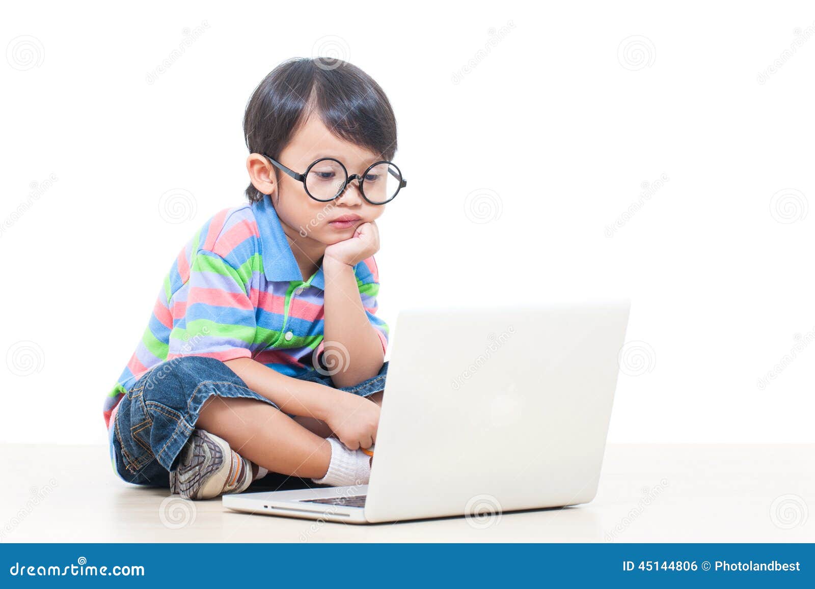 Boy using laptop computer stock photo. Image of leisure - 45144806