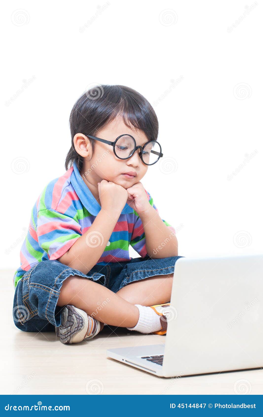 Boy using laptop computer stock image. Image of cute - 45144847