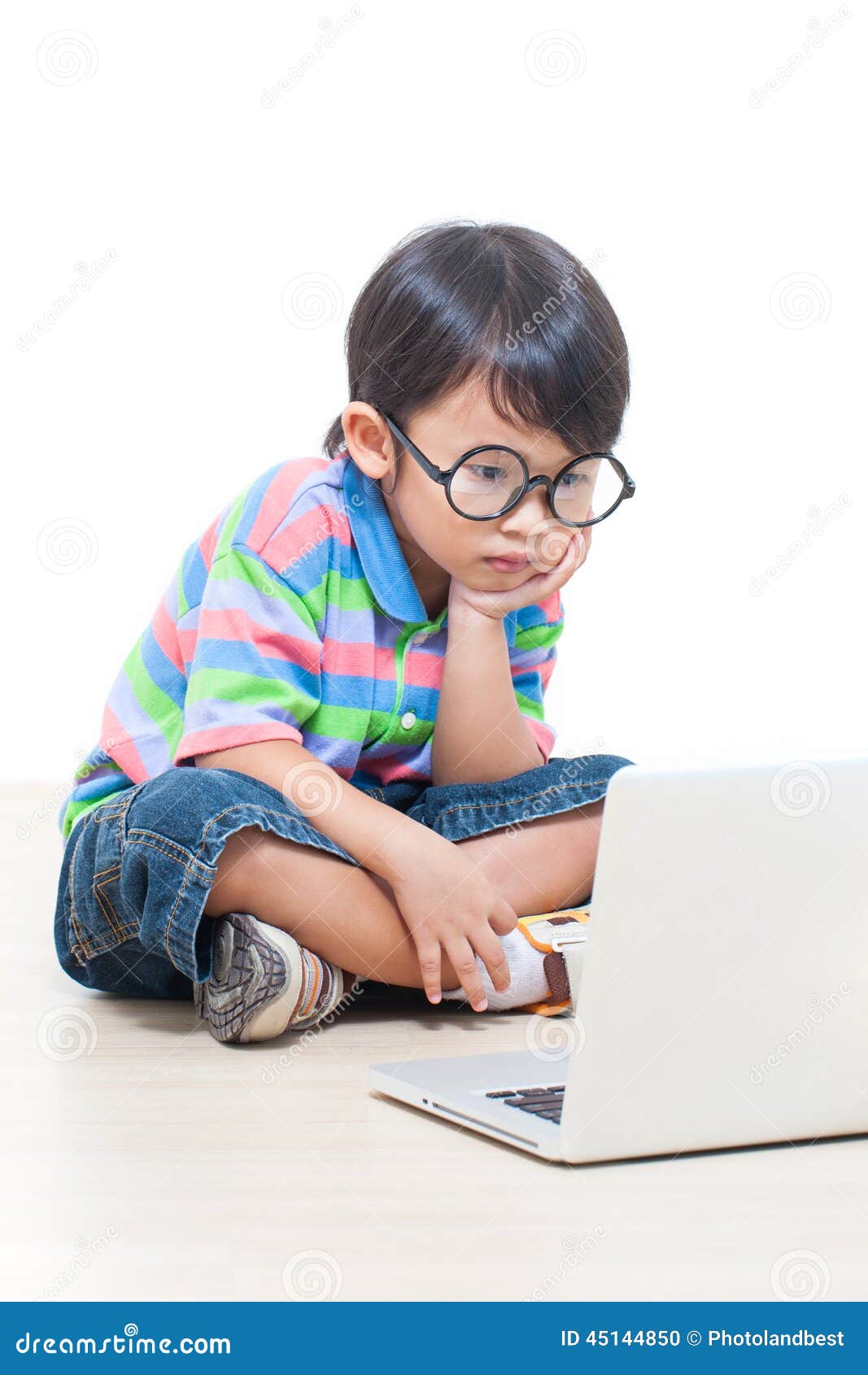 Boy using laptop computer stock photo. Image of male - 45144850