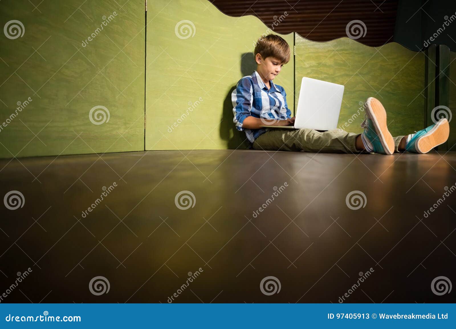 Boy using laptop at home stock image. Image of cute, house - 97405913