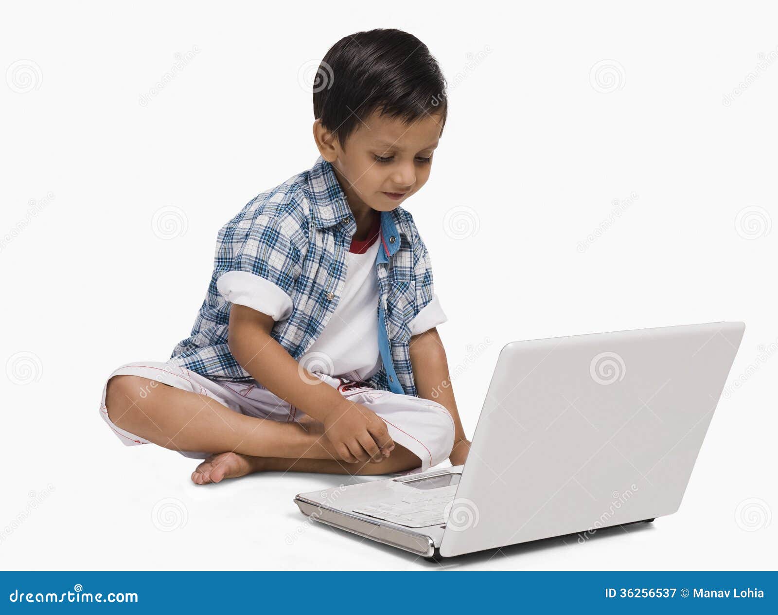 Boy using a laptop stock image. Image of horizontal, looking - 36256537