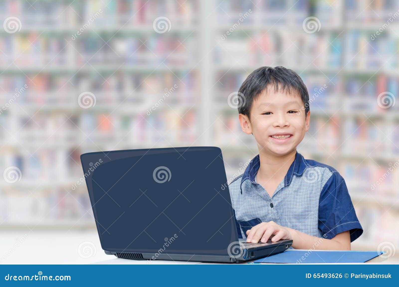 Boy Using Notebook Computer Stock Photo - Image of schoolboy, people ...
