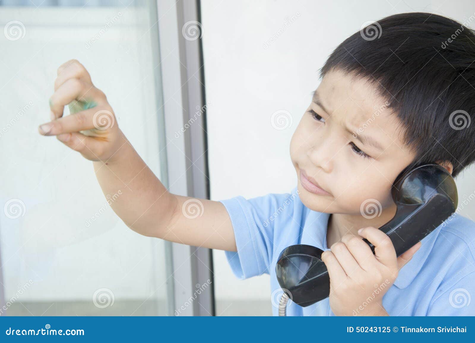 Boy using public phone stock image. Image of talk, phone - 50243125