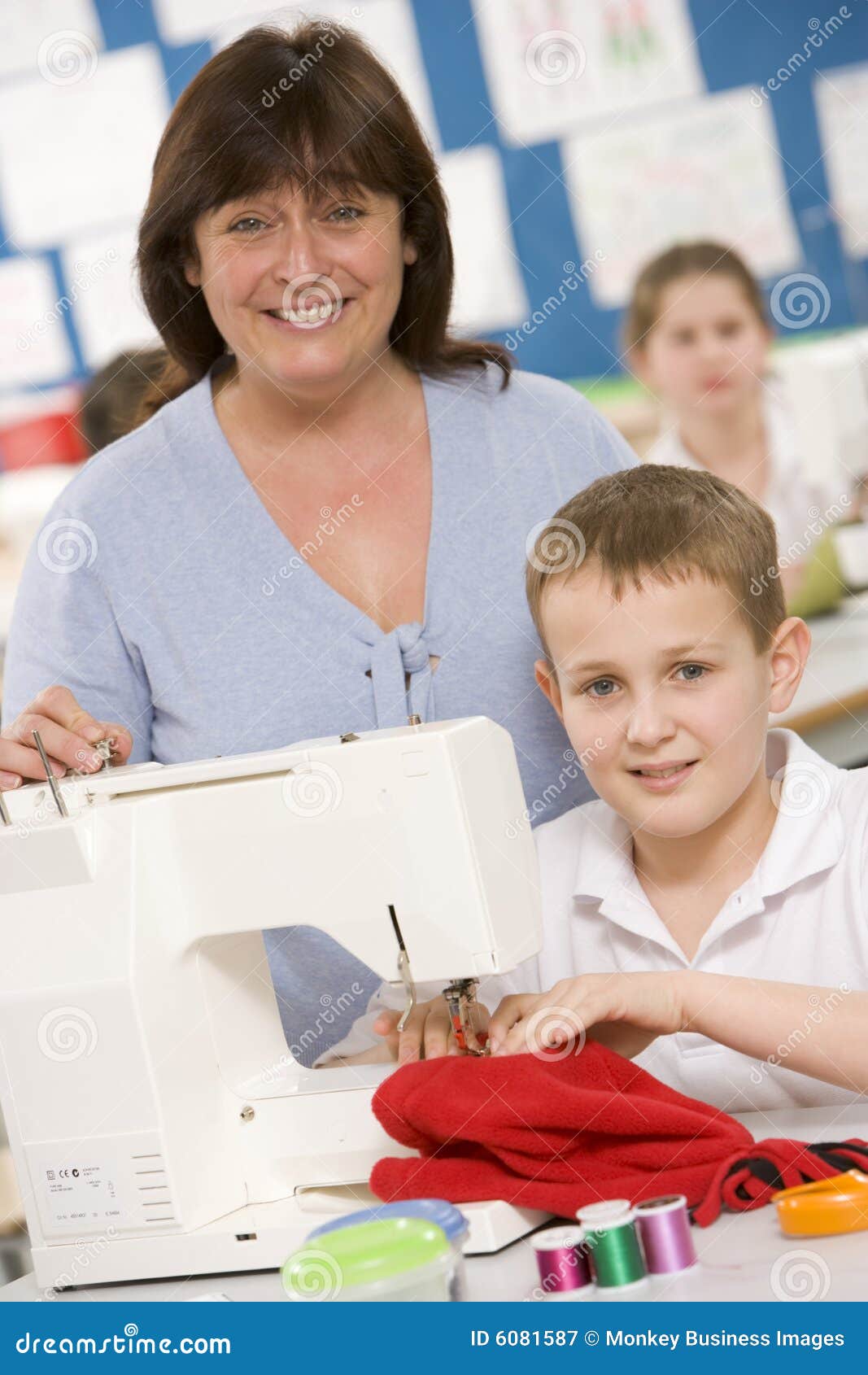 Boy using a sewing machine stock image. Image of adolescent - 6081587