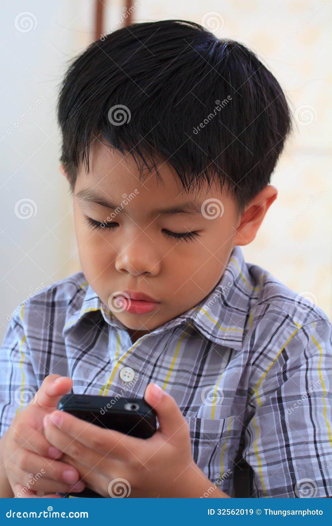 Boy is Using the Smart Phone Stock Image - Image of asian, phone: 32562019