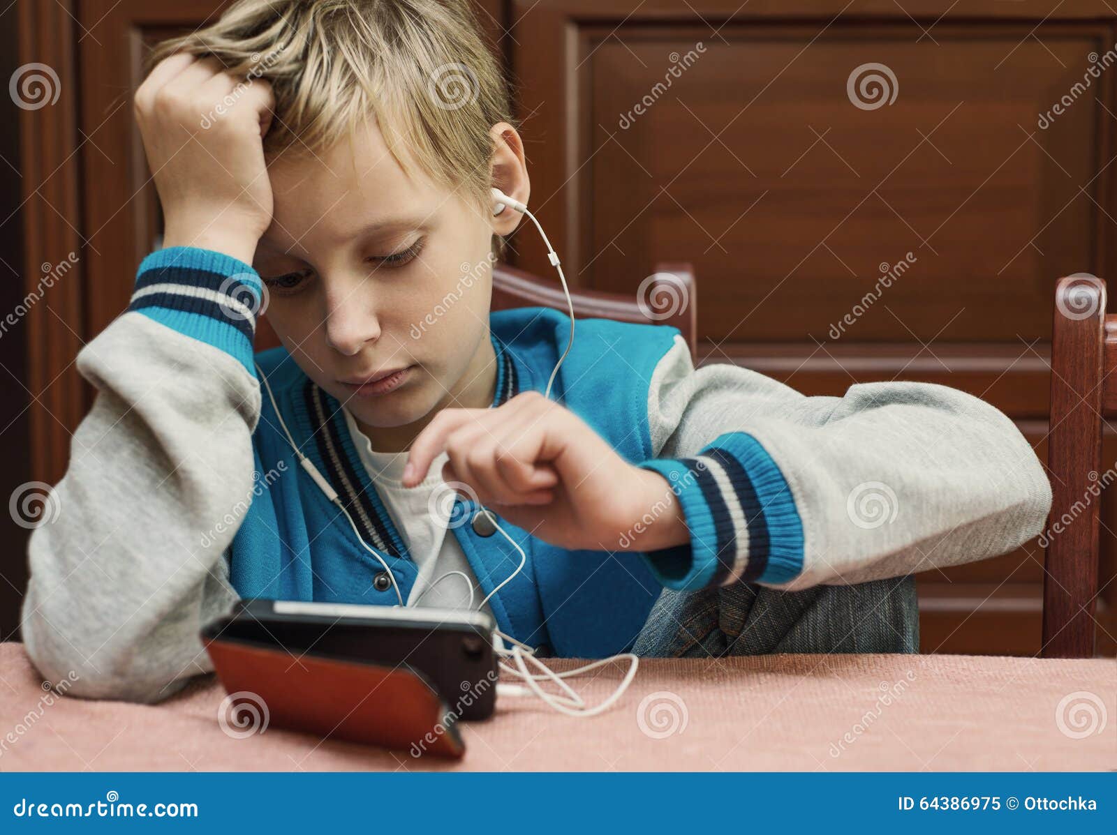 Boy is Using a Smartphone at Home Stock Image - Image of wireless ...