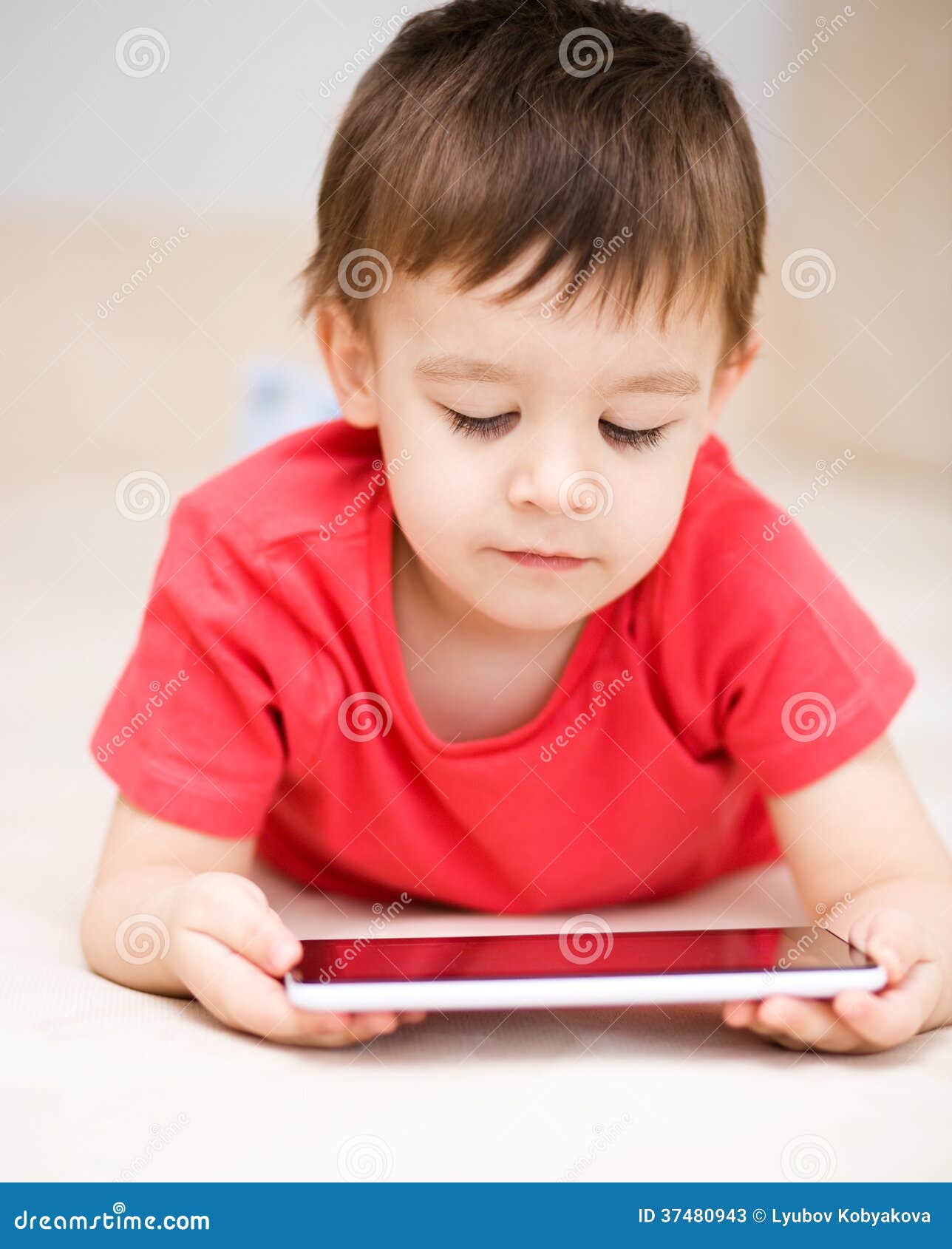 Boy using tablet stock image. Image of casual, lifestyle - 37480943