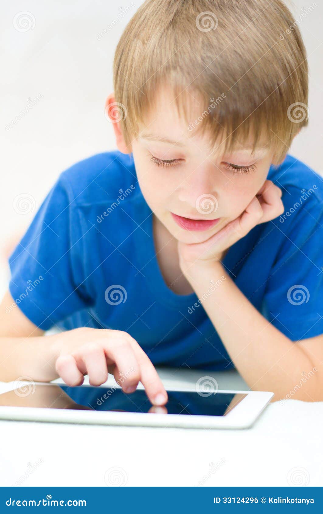 Boy using tablet computer stock photo. Image of children - 33124296