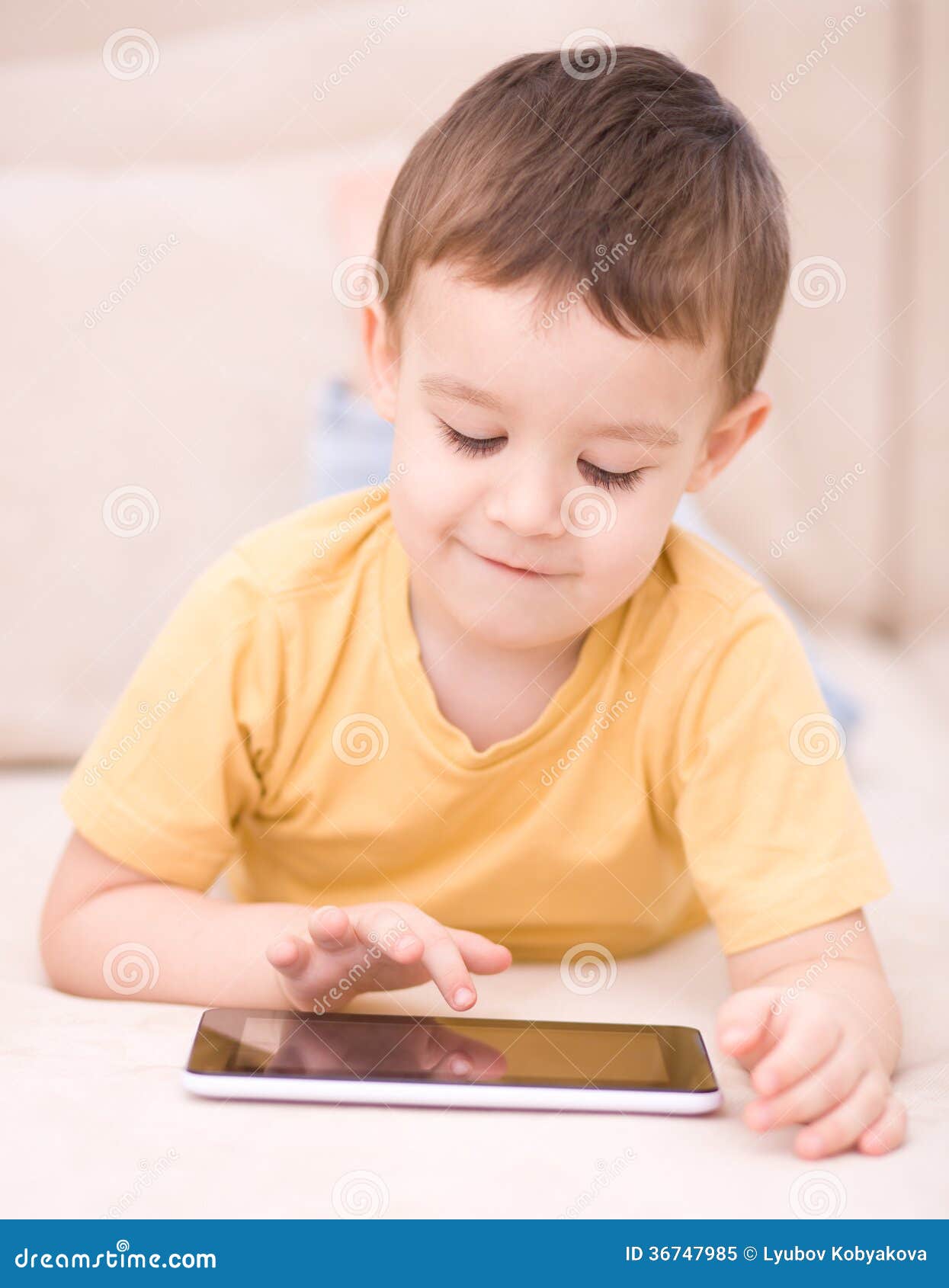 Boy using tablet stock image. Image of news, computer - 36747985