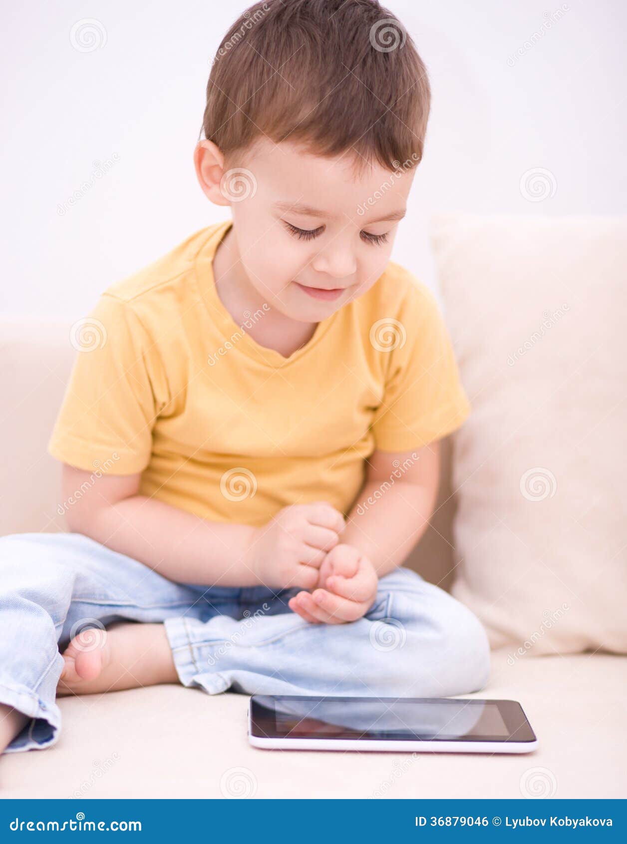 Boy using tablet stock photo. Image of computer, lying - 36879046