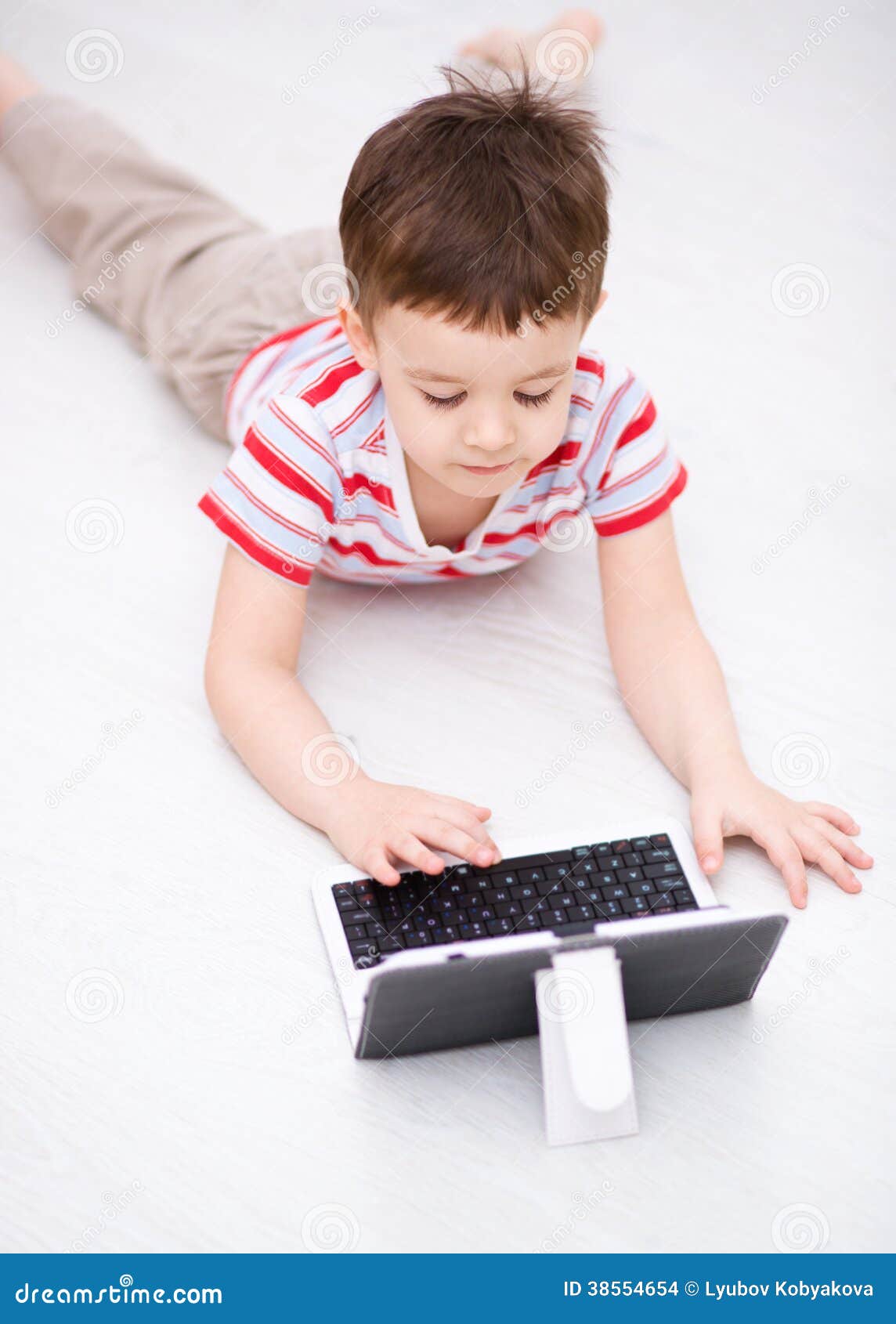 Boy using tablet stock photo. Image of child, pensive - 38554654