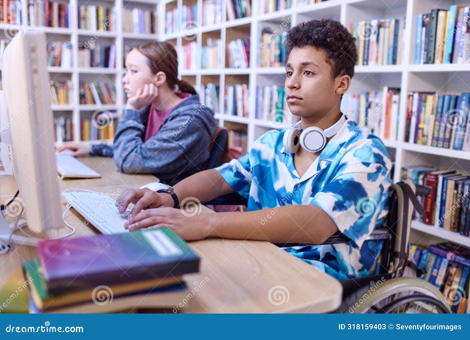 Boy Using Wheelchair in Computer Class Stock Image - Image of ...