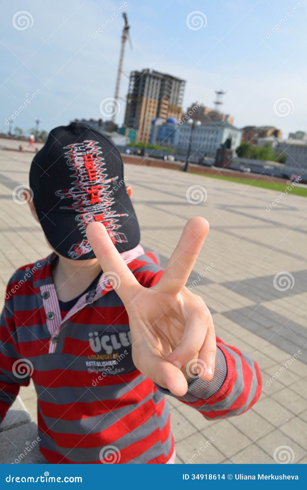 Boy with victory signal stock photo. Image of human, sign - 34918614