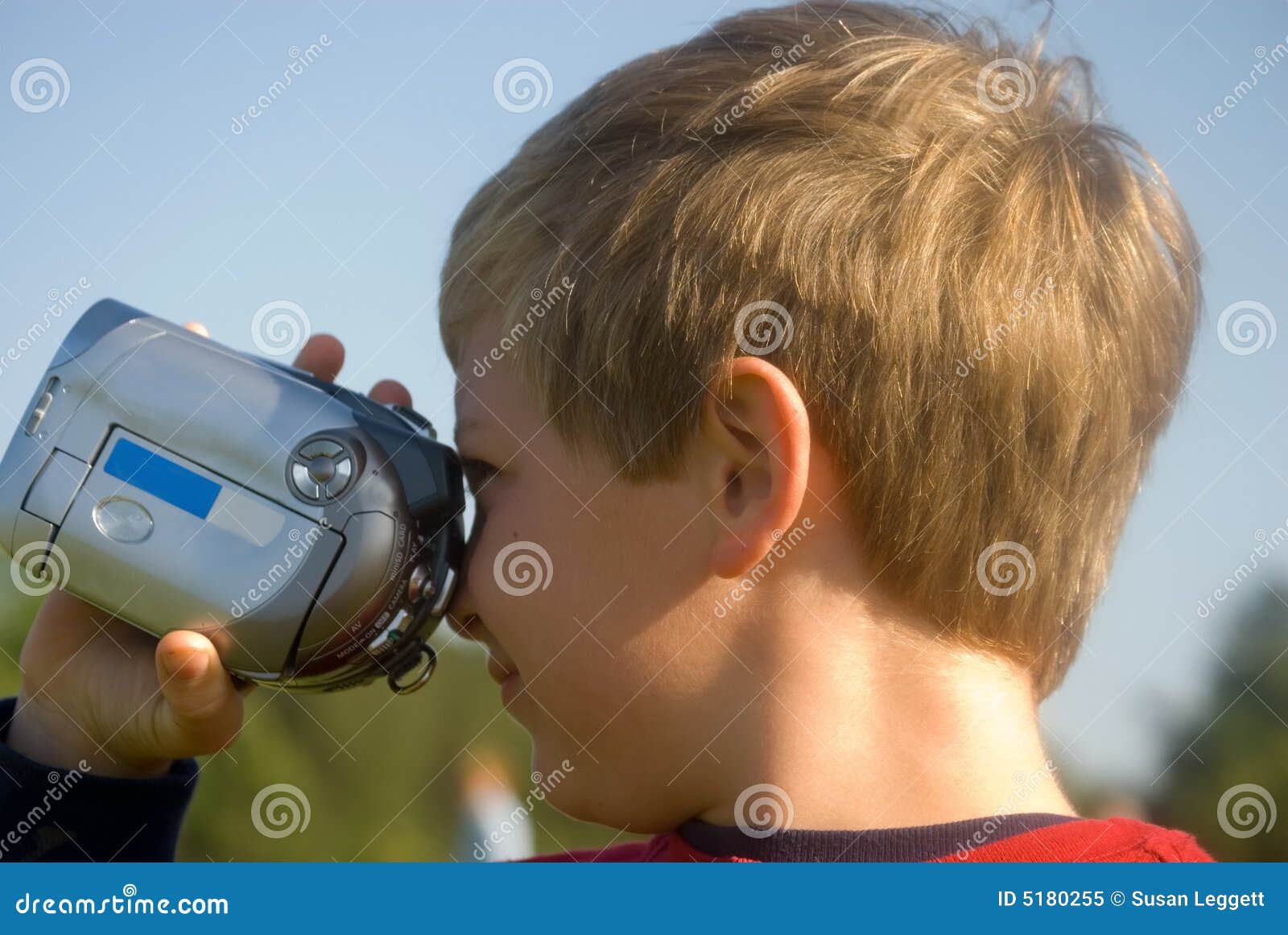 Boy with Video Camera stock image. Image of camera, digital - 5180255