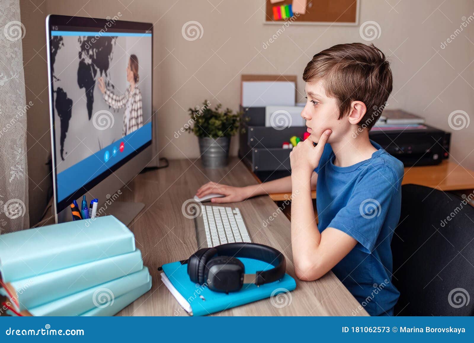 Boy Video Conferences with a Tutor on the Computer at Home. the Concept ...