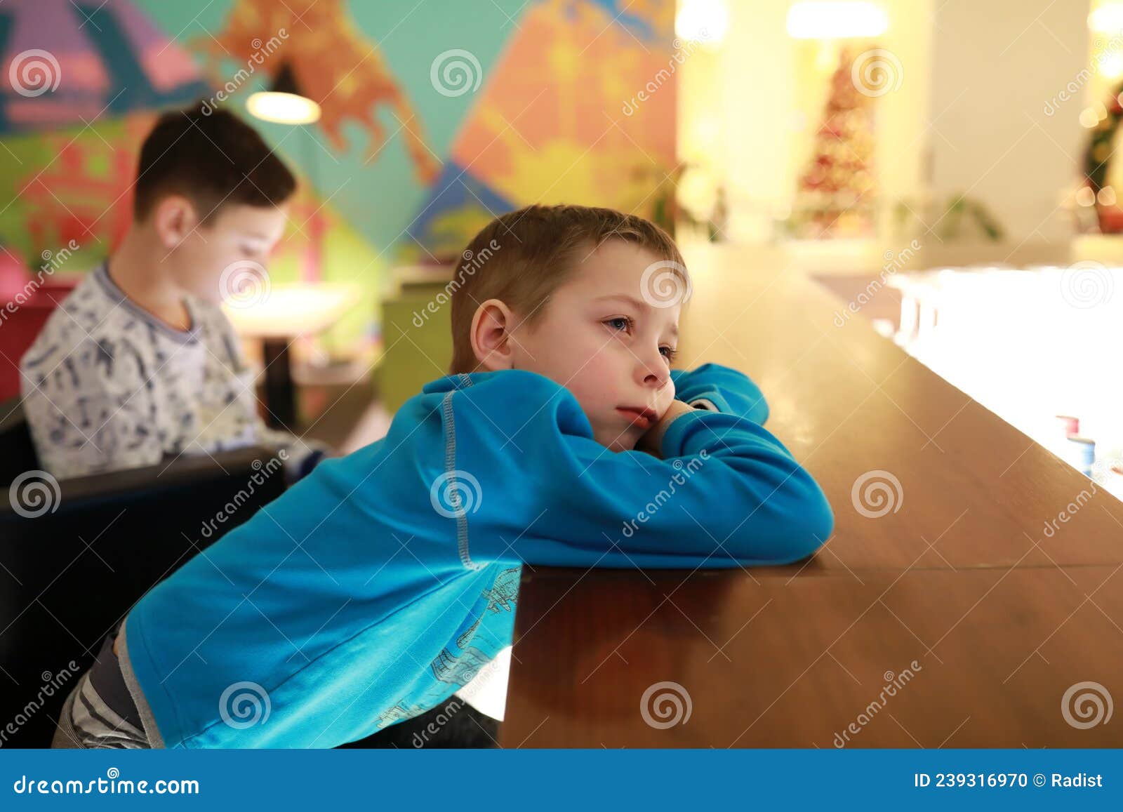 Boy Waiting Food at Bar of Restaurant Stock Photo - Image of night ...