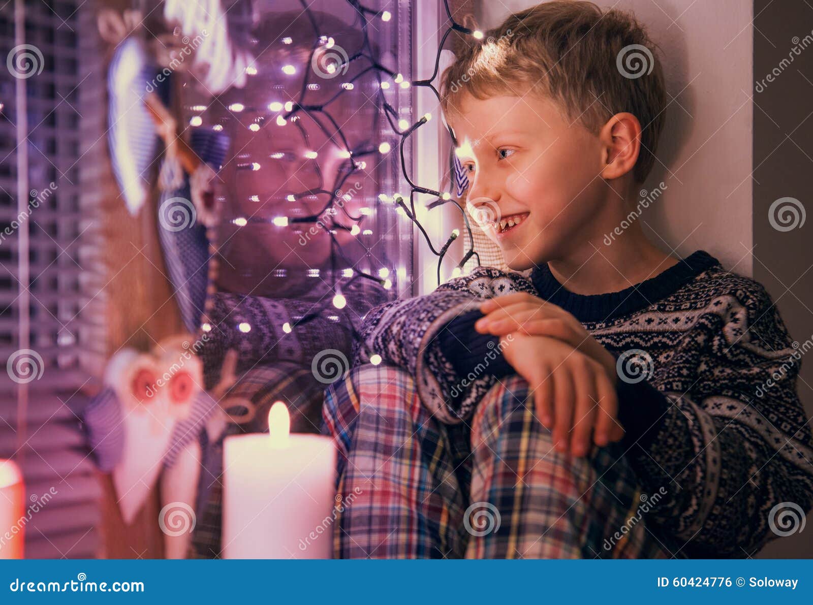 Boy Waiting Santa on the Window with Christmas Lights Stock Photo ...