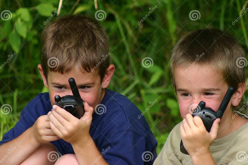 Boy on Walkie Talkies stock photo. Image of communication - 1212242