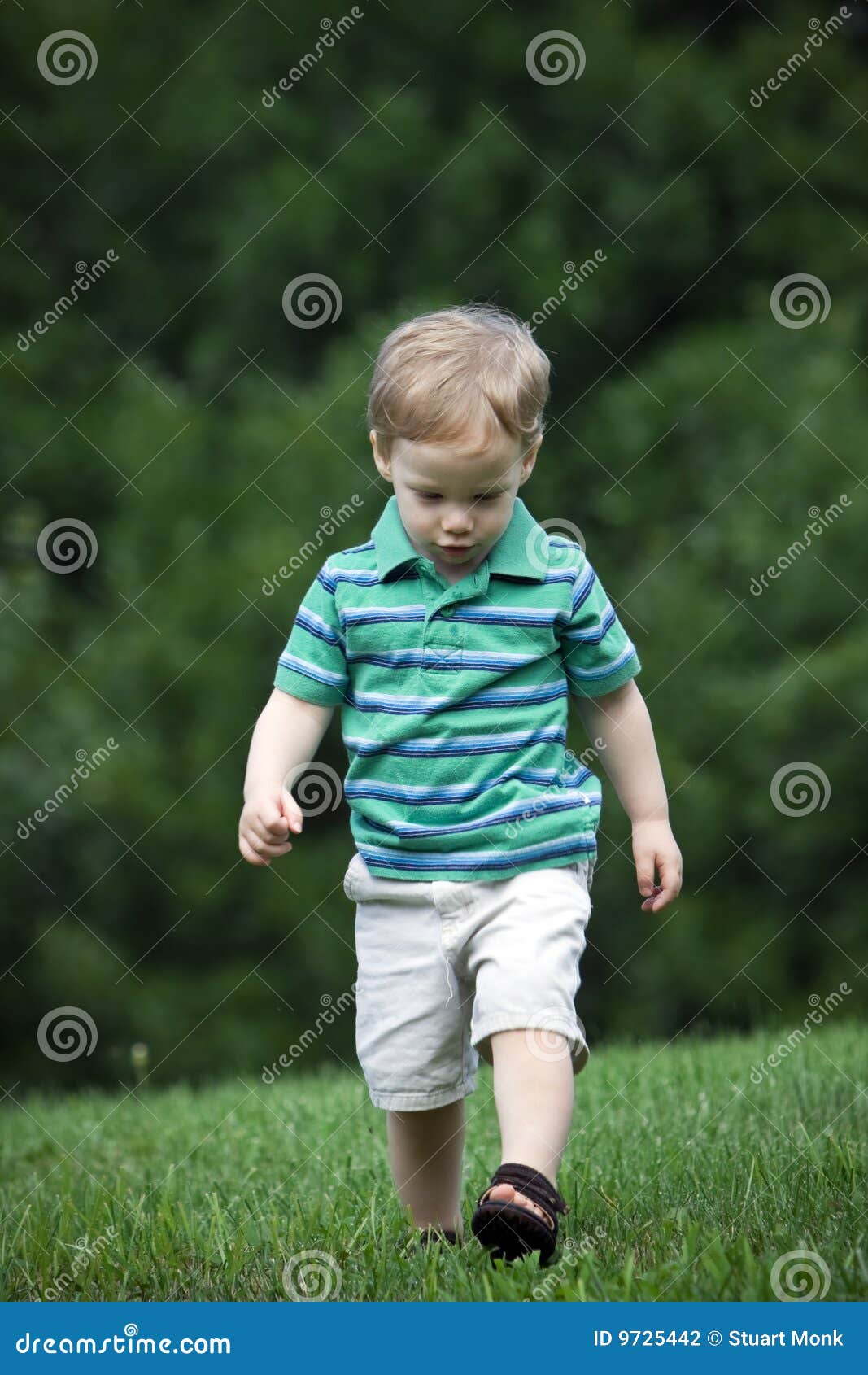 Boy walking stock photo. Image of sandals, leisure, polo - 9725442