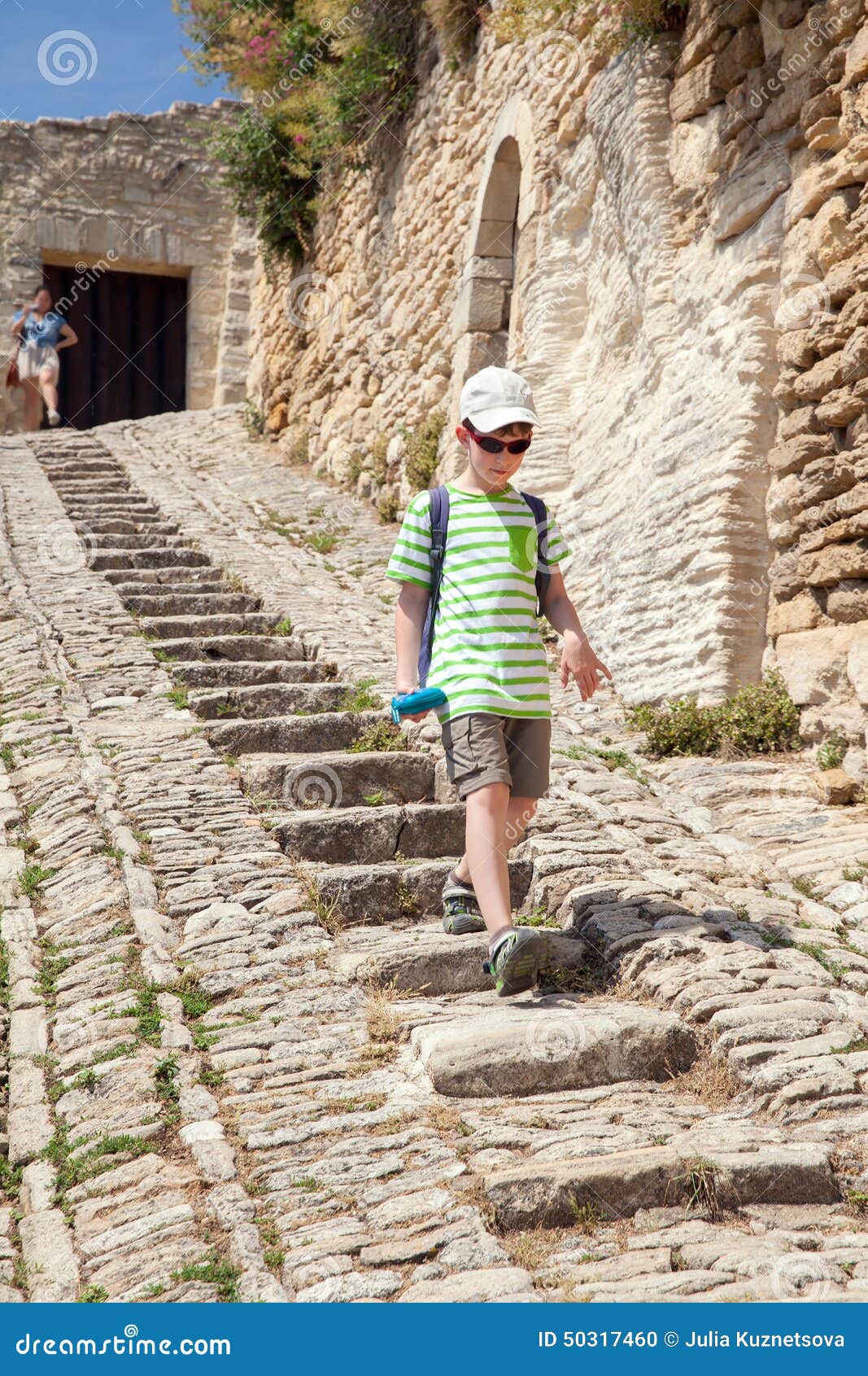 The Boy is Walking Down Stone Steps Stock Photo - Image of sunny, walk ...