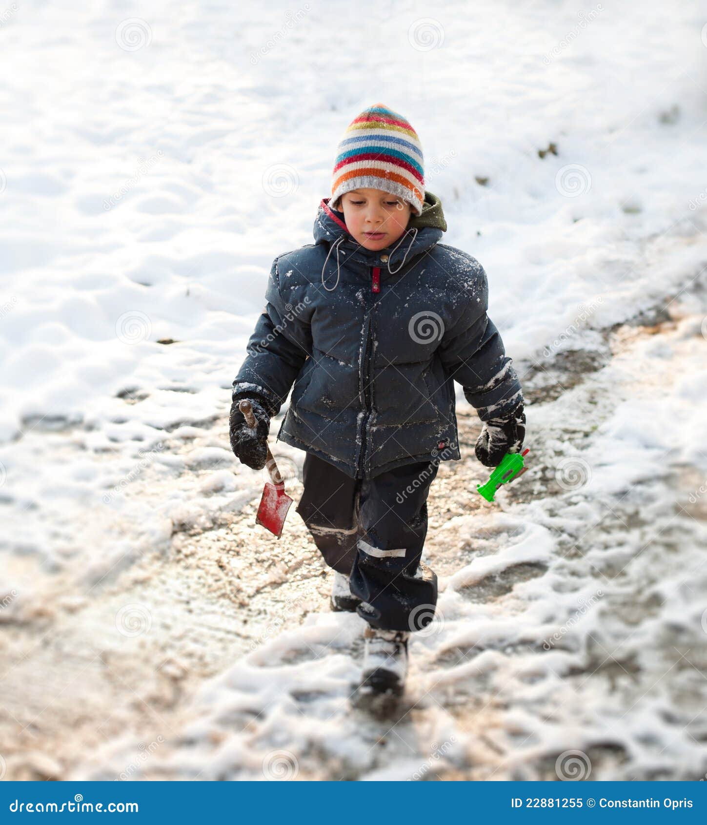 Boy walking in snow stock image. Image of laying, serene - 22881255