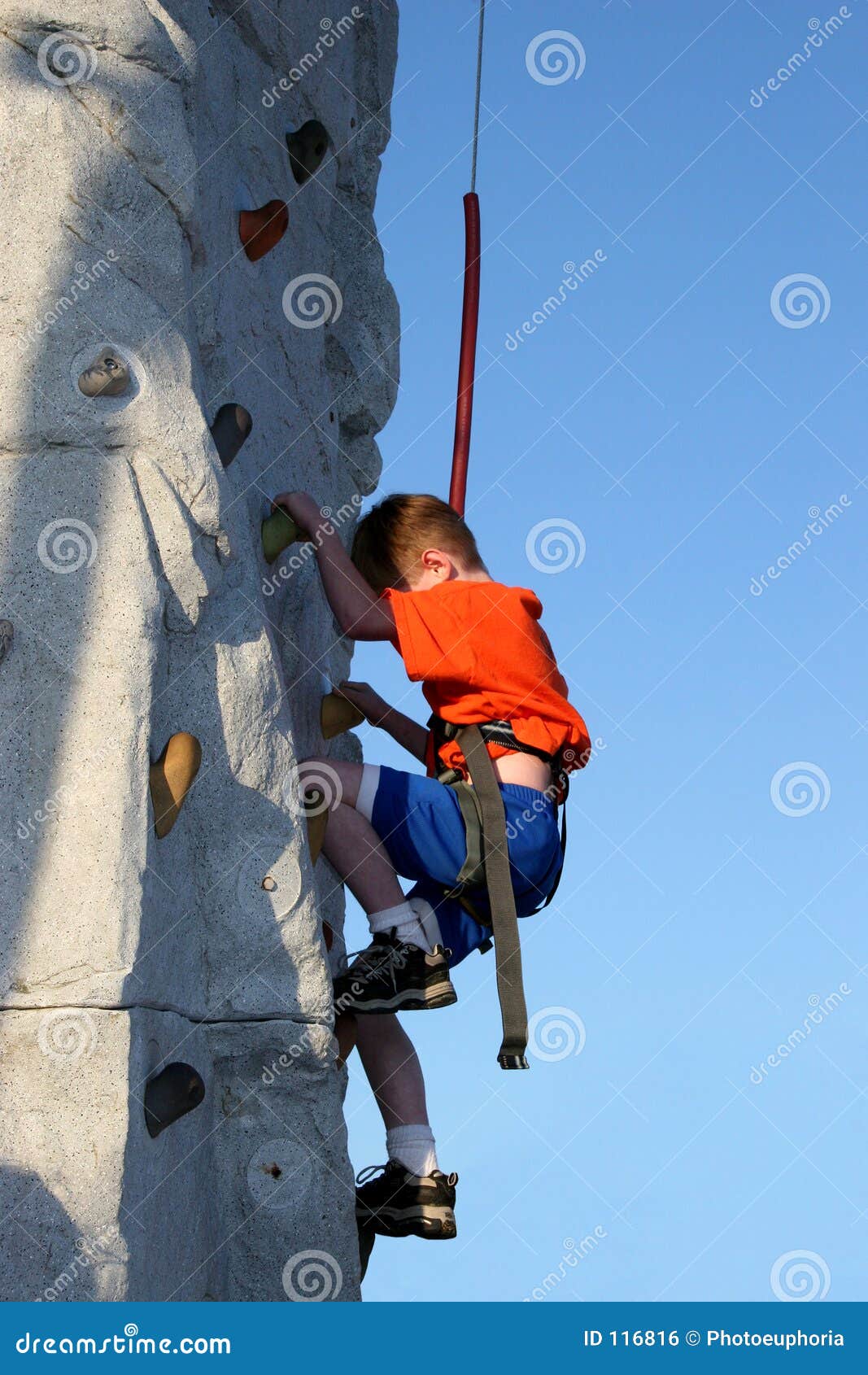 Boy Wall Climbing Outdoors stock photo. Image of safety - 116816