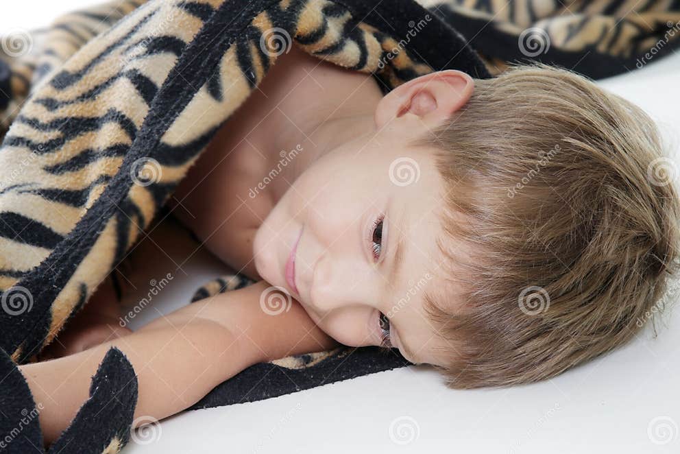 Boy Warped Up with Counterpane Stock Photo - Image of portrait, cheerful: 19063394