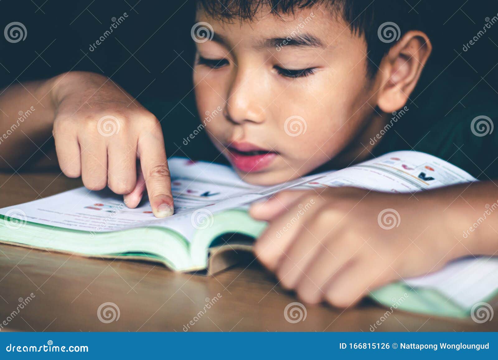 The Boy Was Reading a Book in a Quiet Room, Concept Read a Book Stock ...