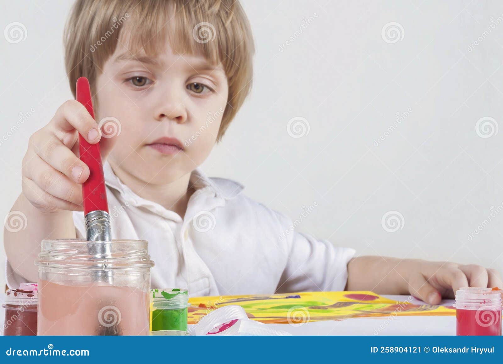 The Boy Wash Paint from Red Paintbrush. he Draws Stock Image - Image of ...