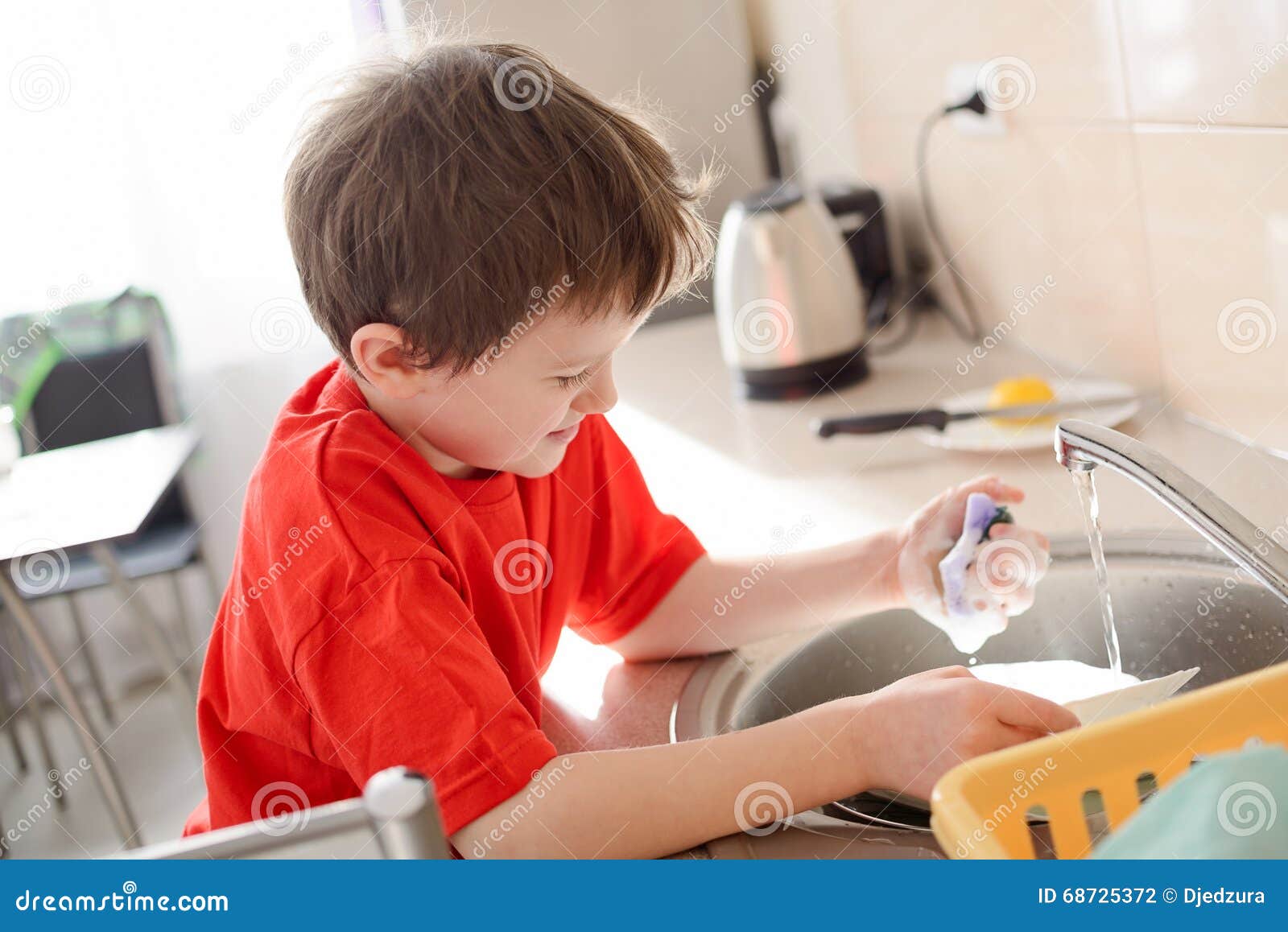 Boy Washes Dishes in the Kitchen Stock Photo - Image of funny, domestic ...