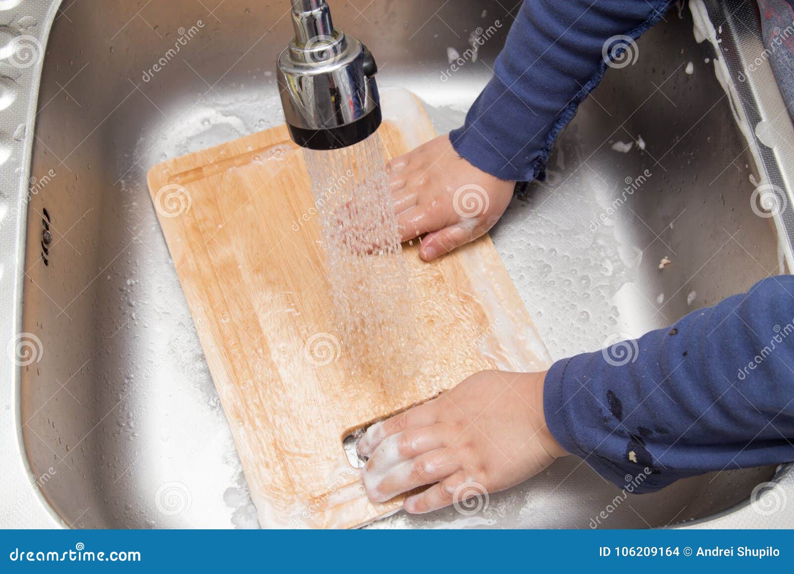 Boy Washing Dishes in the Kitchen Stock Photo - Image of utensils, wash ...