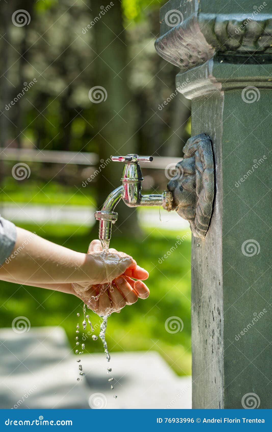 Boy washing hands outside stock photo. Image of outside - 76933996